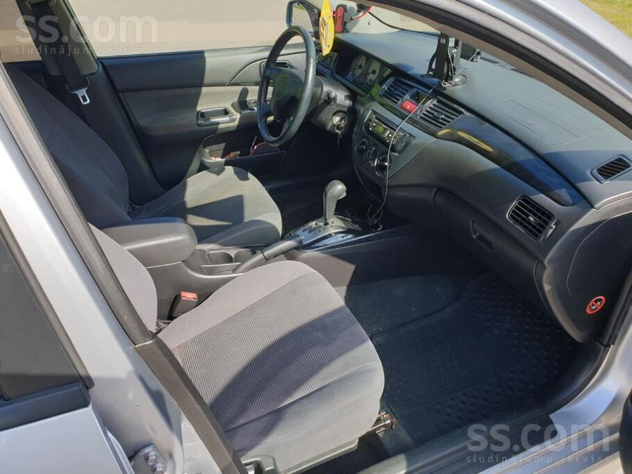 Pelēks Mitsubishi Lancer 2005 Rīga, ar dzinēja tilpumu 1.60 L un nobraukumu 130 tūkst. km par 1500 €, foto 3 vietnē AUTOMOTO.COM.LV
