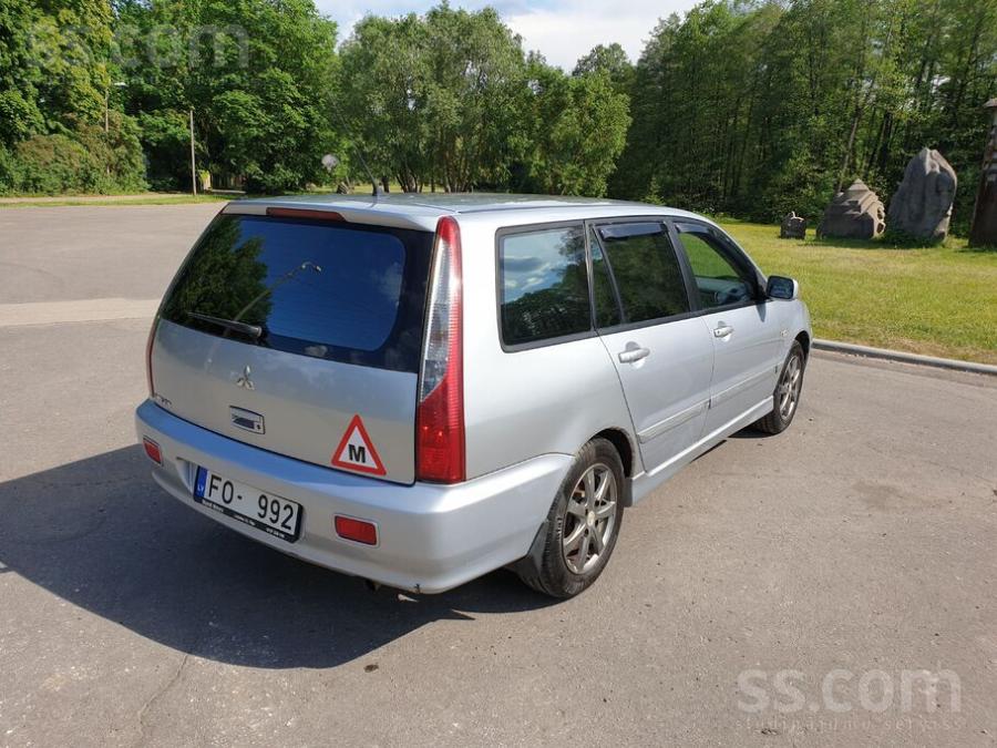 Pelēks Mitsubishi Lancer 2005 Rīga, ar dzinēja tilpumu 1.60 L un nobraukumu 130 tūkst. km par 1500 €, foto 6 vietnē AUTOMOTO.COM.LV