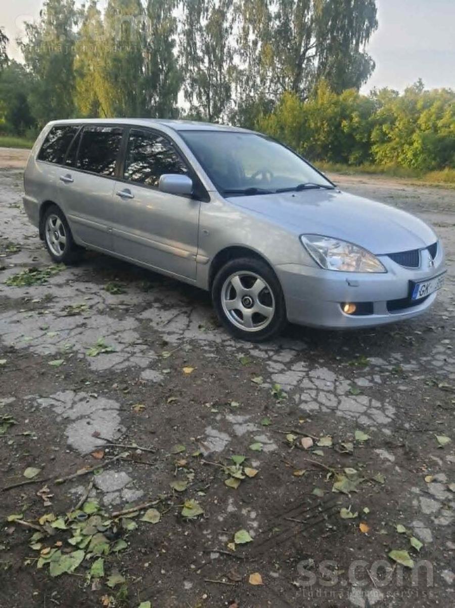 Grey Mitsubishi Lancer 2005 in Ogre, with an engine capacity of 1.60 L and mileage of 0 thousand km for 1650 €, photo 3 on AUTOMOTO.COM.LV