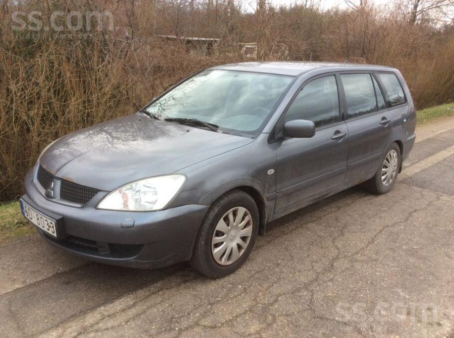 Grey Mitsubishi Lancer 2006 in Riga, with an engine capacity of 1.60 L and mileage of 218 thousand km for 1150 €, photo 1 on AUTOMOTO.COM.LV