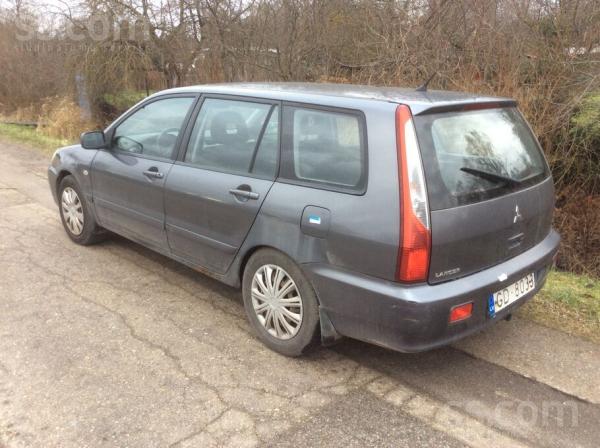 Grey Mitsubishi Lancer 2006 in Riga, with an engine capacity of 1.60 L and mileage of 218 thousand km for 1150 €, photo 2 on AUTOMOTO.COM.LV