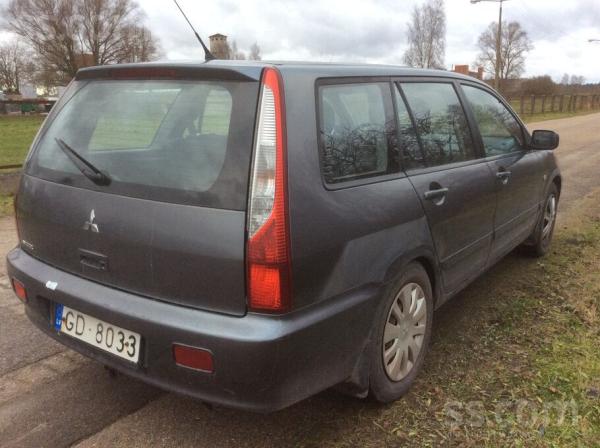 Grey Mitsubishi Lancer 2006 in Riga, with an engine capacity of 1.60 L and mileage of 218 thousand km for 1150 €, photo 3 on AUTOMOTO.COM.LV