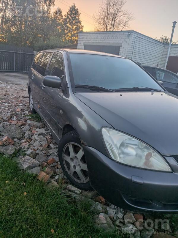 Grey Mitsubishi Lancer 2007 in Riga, with an engine capacity of 1.60 L and mileage of 232 thousand km for 500 €, photo 3 on AUTOMOTO.COM.LV