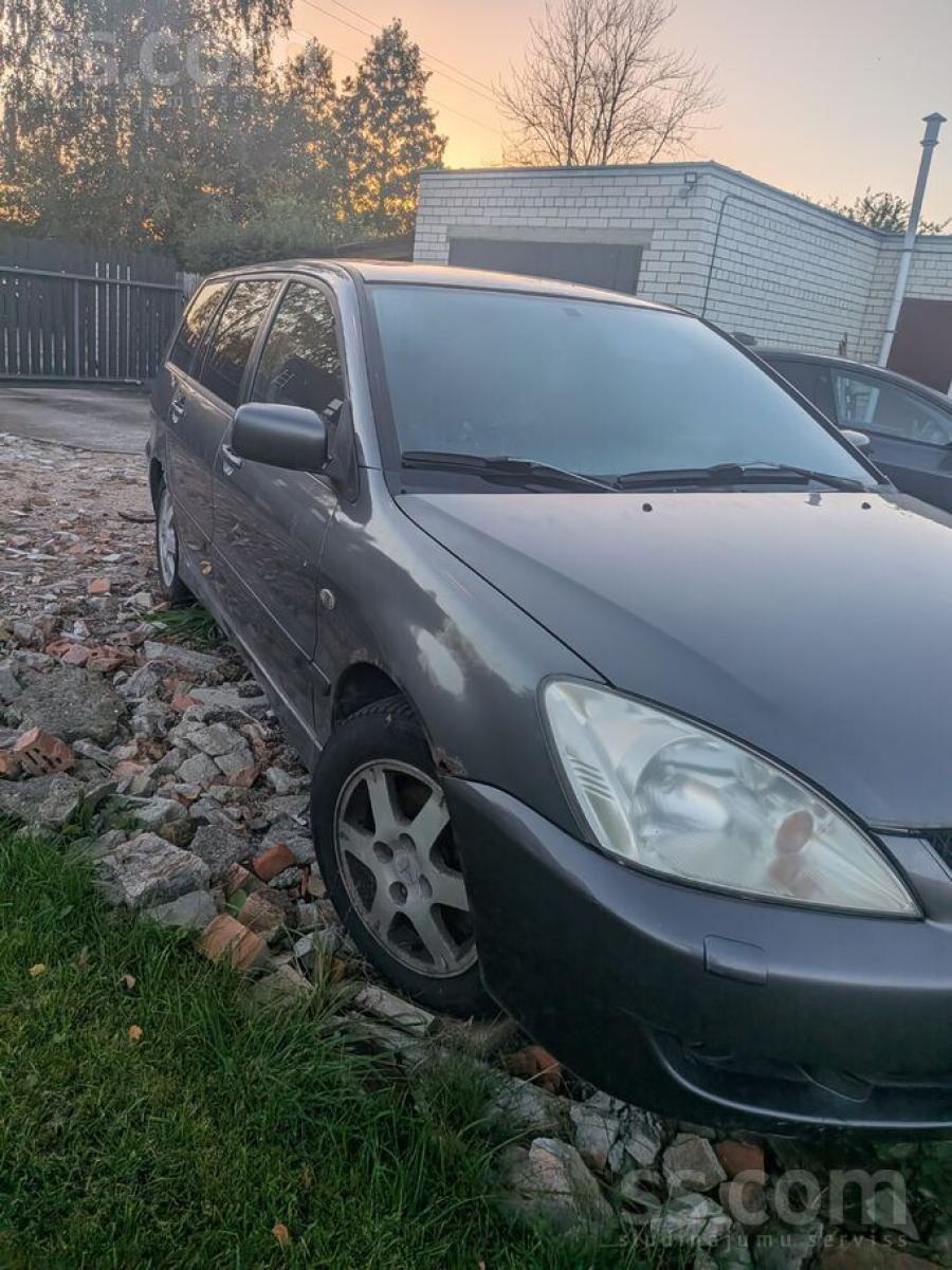 Grey Mitsubishi Lancer 2007 in Riga, with an engine capacity of 1.60 L and mileage of 232 thousand km for 500 €, photo 3 on AUTOMOTO.COM.LV