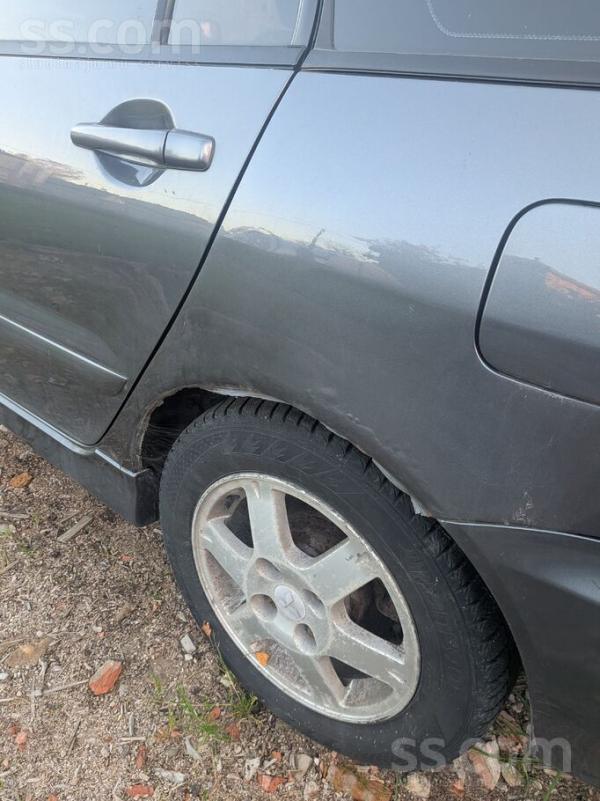 Grey Mitsubishi Lancer 2007 in Riga, with an engine capacity of 1.60 L and mileage of 232 thousand km for 500 €, photo 5 on AUTOMOTO.COM.LV