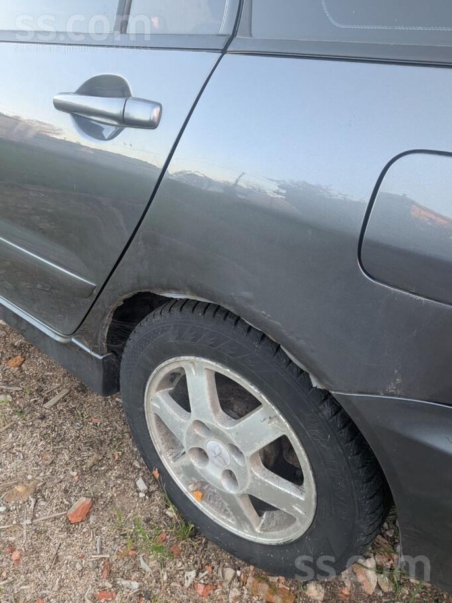 Grey Mitsubishi Lancer 2007 in Riga, with an engine capacity of 1.60 L and mileage of 232 thousand km for 500 €, photo 5 on AUTOMOTO.COM.LV