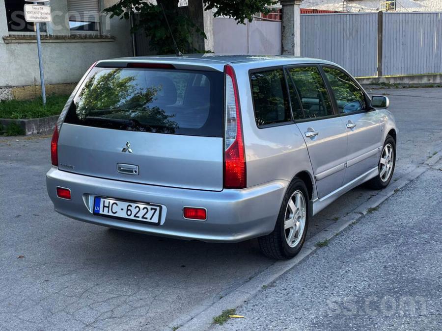 Grey Mitsubishi Lancer 2008 in Riga, with an engine capacity of 1.60 L and mileage of 199 thousand km for 1350 €, photo 4 on AUTOMOTO.COM.LV