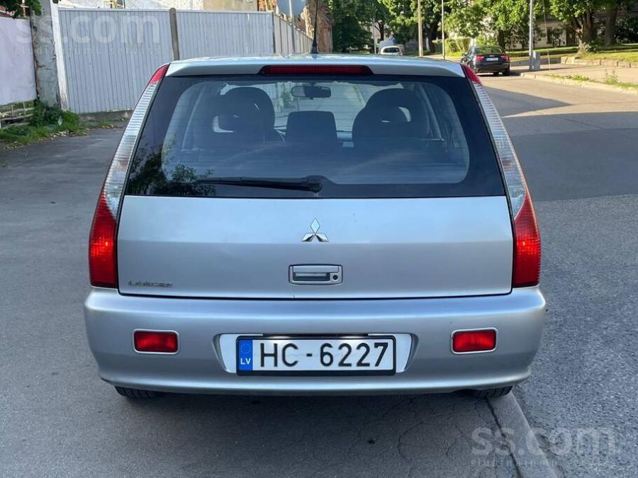 Grey Mitsubishi Lancer 2008 in Riga, with an engine capacity of 1.60 L and mileage of 199 thousand km for 1350 €, photo 6 on AUTOMOTO.COM.LV
