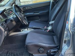 Grey Mitsubishi Lancer 2008 in Riga, with an engine capacity of 1.60 L and mileage of 199 thousand km for 1350 €, photo 8 on AUTOMOTO.COM.LV