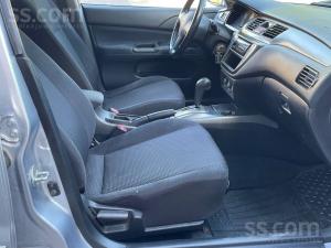 Grey Mitsubishi Lancer 2008 in Riga, with an engine capacity of 1.60 L and mileage of 199 thousand km for 1350 €, photo 10 on AUTOMOTO.COM.LV