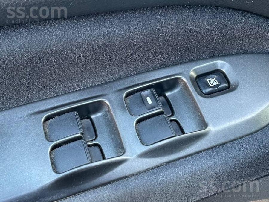 Grey Mitsubishi Lancer 2008 in Riga, with an engine capacity of 1.60 L and mileage of 199 thousand km for 1350 €, photo 12 on AUTOMOTO.COM.LV