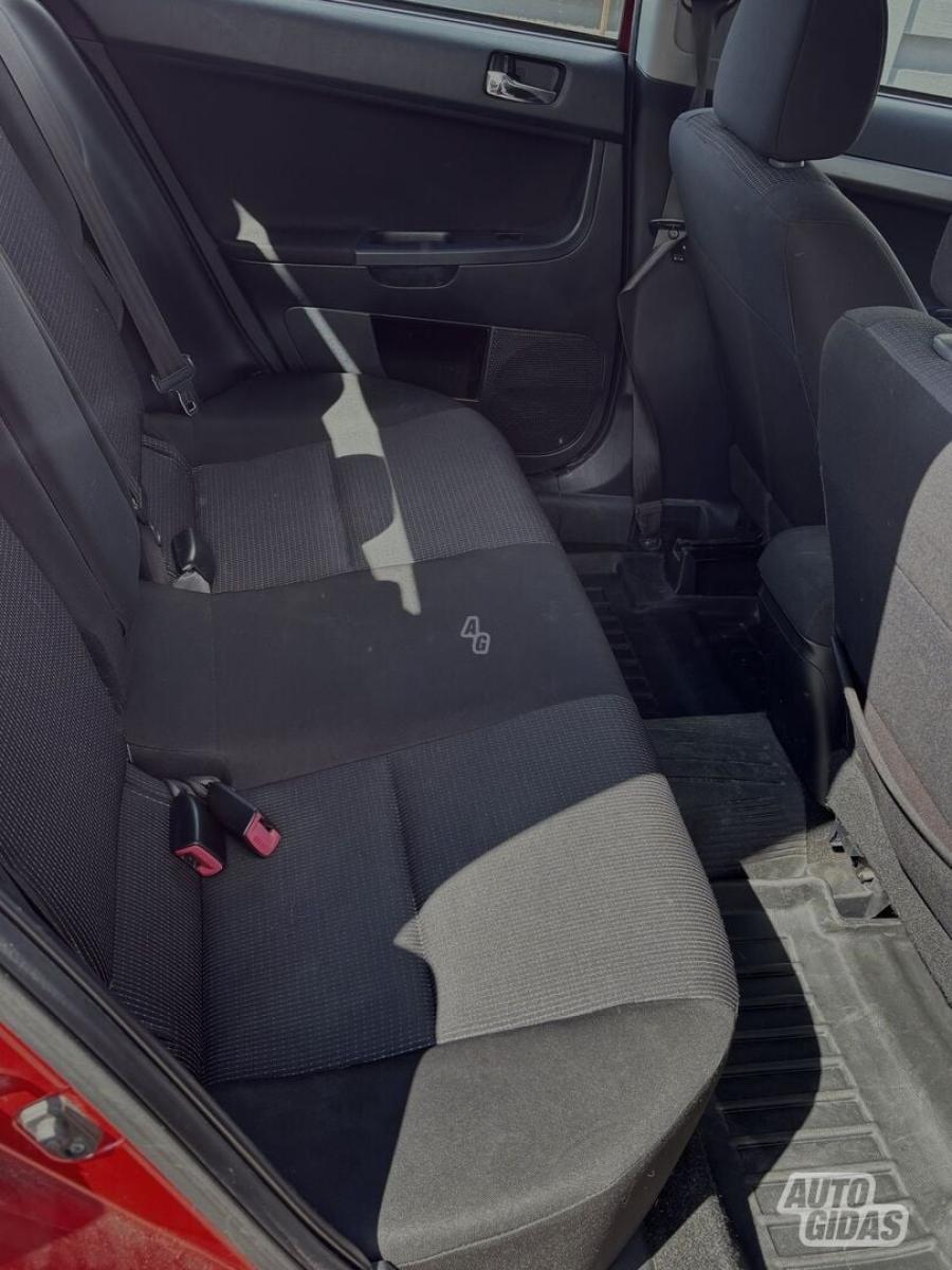 Mitsubishi Lancer 2009 in Klaipeda, with an engine capacity of 1.80 L and mileage of 248 thousand km for 1500 €, photo 6 on AUTOMOTO.COM.LV