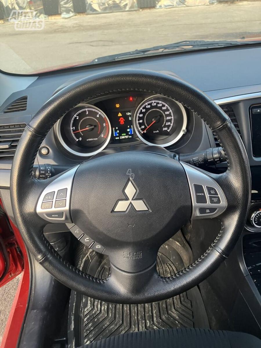 Mitsubishi Lancer 2015 in Vilnius, with an engine capacity of 1.80 L and mileage of 238 thousand km for 2999 €, photo 11 on AUTOMOTO.COM.LV