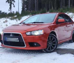 Oranžs Mitsubishi Lancer 2010 Marijampole, ar dzinēja tilpumu 2.00 L un nobraukumu 276 tūkst. km par 7200 €, foto  vietnē AUTOMOTO.COM.LV