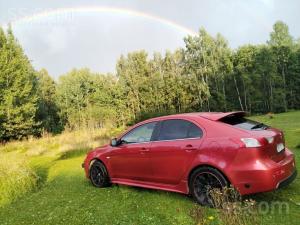 Red Mitsubishi Lancer 2008 in Riga, with an engine capacity of 1.80 L and mileage of 319 thousand km for 2800 €, photo  on AUTOMOTO.COM.LV