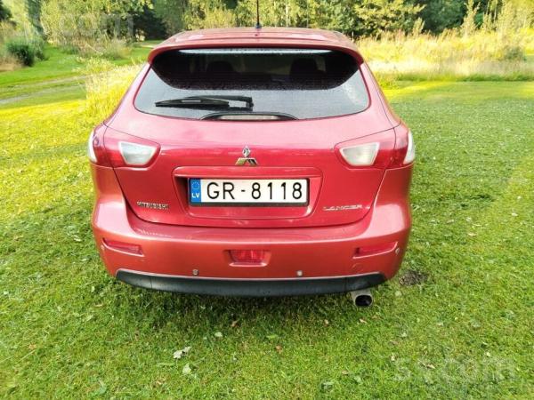 Sarkans Mitsubishi Lancer 2008 Rīga, ar dzinēja tilpumu 1.80 L un nobraukumu 319 tūkst. km par 2800 €, foto 2 vietnē AUTOMOTO.COM.LV
