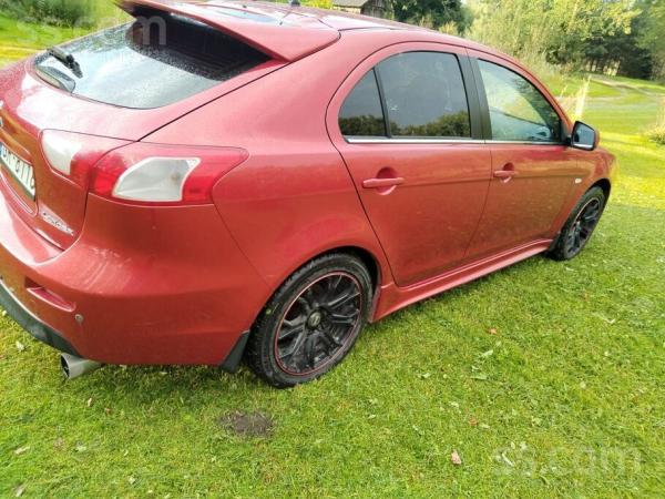 Sarkans Mitsubishi Lancer 2008 Rīga, ar dzinēja tilpumu 1.80 L un nobraukumu 319 tūkst. km par 2800 €, foto 8 vietnē AUTOMOTO.COM.LV