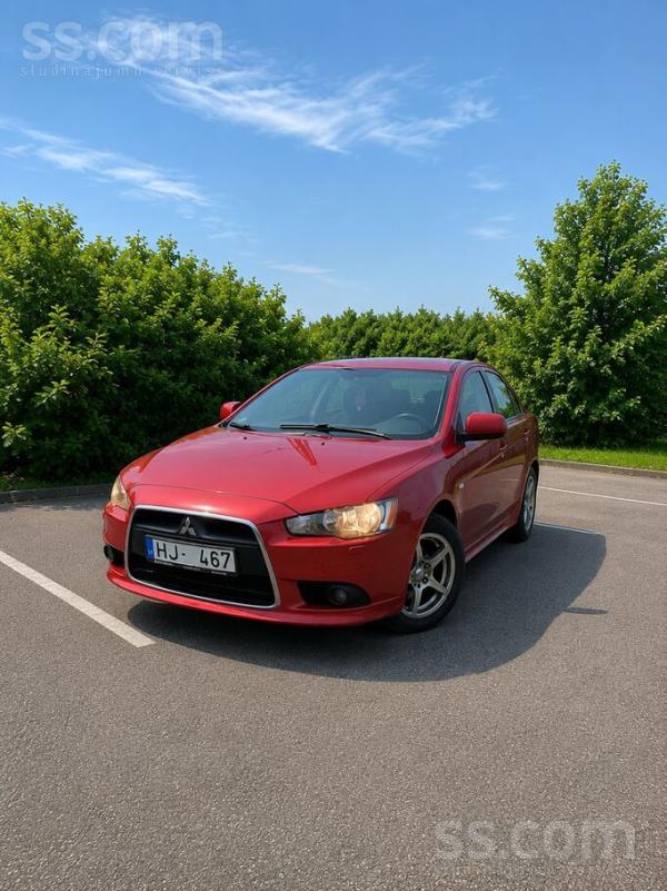 Sarkans Mitsubishi Lancer 2009 Rīga, ar dzinēja tilpumu 1.80 L un nobraukumu 244 tūkst. km par 2950 €, foto 1 vietnē AUTOMOTO.COM.LV
