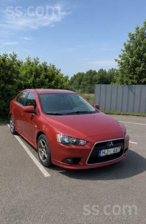 Red Mitsubishi Lancer 2009 in Riga, with an engine capacity of 1.80 L and mileage of 244 thousand km for 2950 €, photo 3 on AUTOMOTO.COM.LV