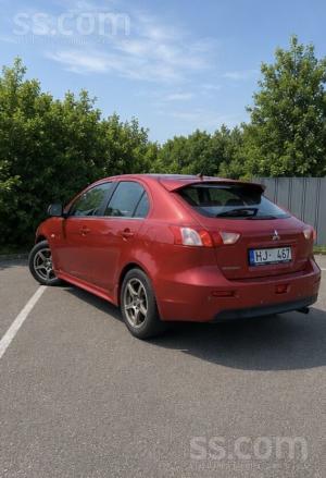 Red Mitsubishi Lancer 2009 in Riga, with an engine capacity of 1.80 L and mileage of 244 thousand km for 2950 €, photo 4 on AUTOMOTO.COM.LV