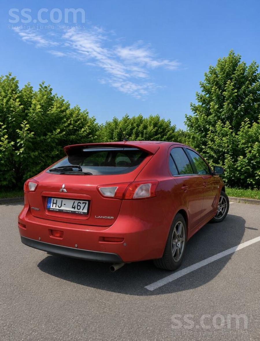 Red Mitsubishi Lancer 2009 in Riga, with an engine capacity of 1.80 L and mileage of 244 thousand km for 2950 €, photo 5 on AUTOMOTO.COM.LV