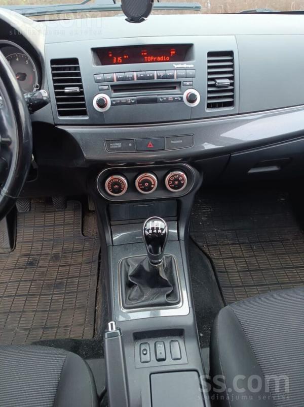 Sarkans Mitsubishi Lancer 2009 Rīga, ar dzinēja tilpumu 1.80 L un nobraukumu 244 tūkst. km par 2950 €, foto 6 vietnē AUTOMOTO.COM.LV