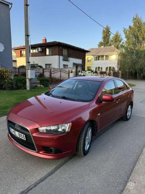 Red Mitsubishi Lancer 2009 in Vilnius, with an engine capacity of 1.80 L and mileage of 249 thousand km for 1950 €, photo  on AUTOMOTO.COM.LV