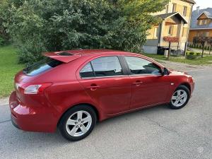 Red Mitsubishi Lancer 2009 in Vilnius, with an engine capacity of 1.80 L and mileage of 249 thousand km for 1950 €, photo 5 on AUTOMOTO.COM.LV