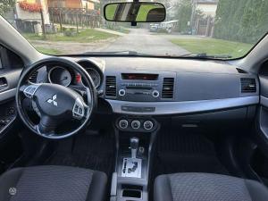 Red Mitsubishi Lancer 2009 in Vilnius, with an engine capacity of 1.80 L and mileage of 249 thousand km for 1950 €, photo 14 on AUTOMOTO.COM.LV