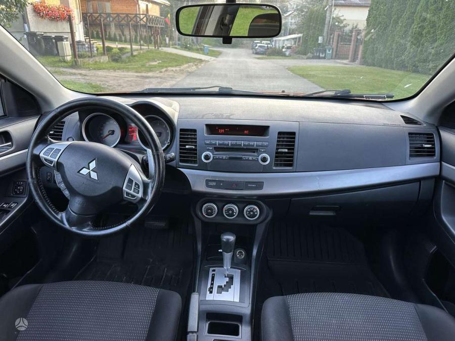 Red Mitsubishi Lancer 2009 in Vilnius, with an engine capacity of 1.80 L and mileage of 249 thousand km for 1950 €, photo 14 on AUTOMOTO.COM.LV