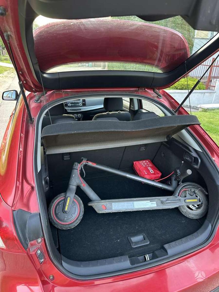 Red Mitsubishi Lancer 2009 in Vilnius, with an engine capacity of 1.80 L and mileage of 249 thousand km for 1950 €, photo 15 on AUTOMOTO.COM.LV