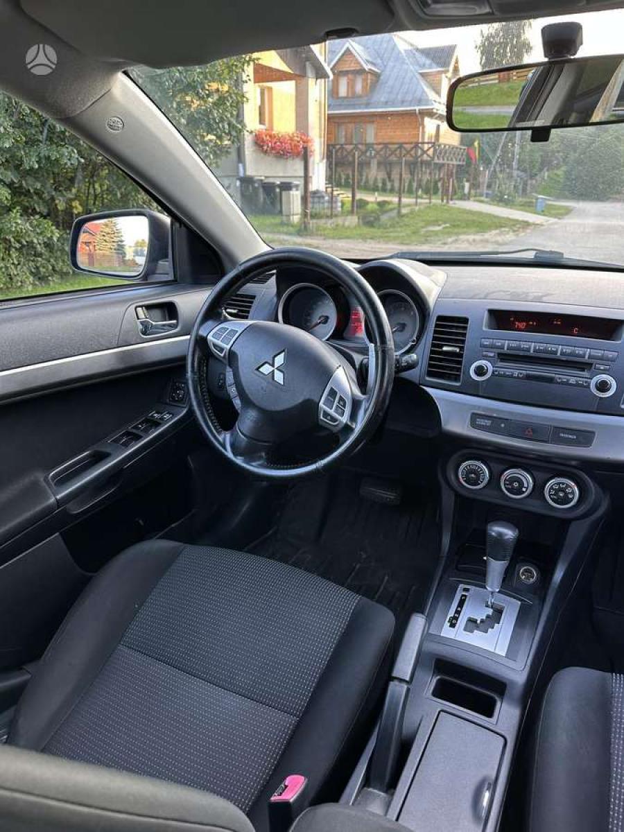 Red Mitsubishi Lancer 2009 in Vilnius, with an engine capacity of 1.80 L and mileage of 249 thousand km for 1950 €, photo 20 on AUTOMOTO.COM.LV