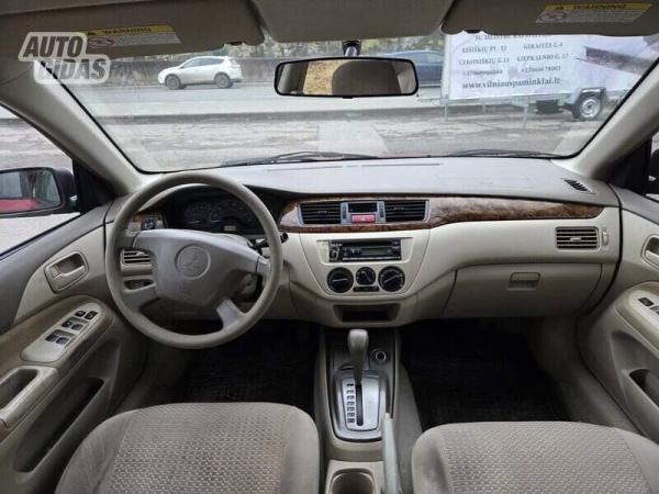 Sarkans Mitsubishi Lancer 2002 Marijampole, ar dzinēja tilpumu 2.00 L un nobraukumu 194 tūkst. km par 1800 €, foto 3 vietnē AUTOMOTO.COM.LV