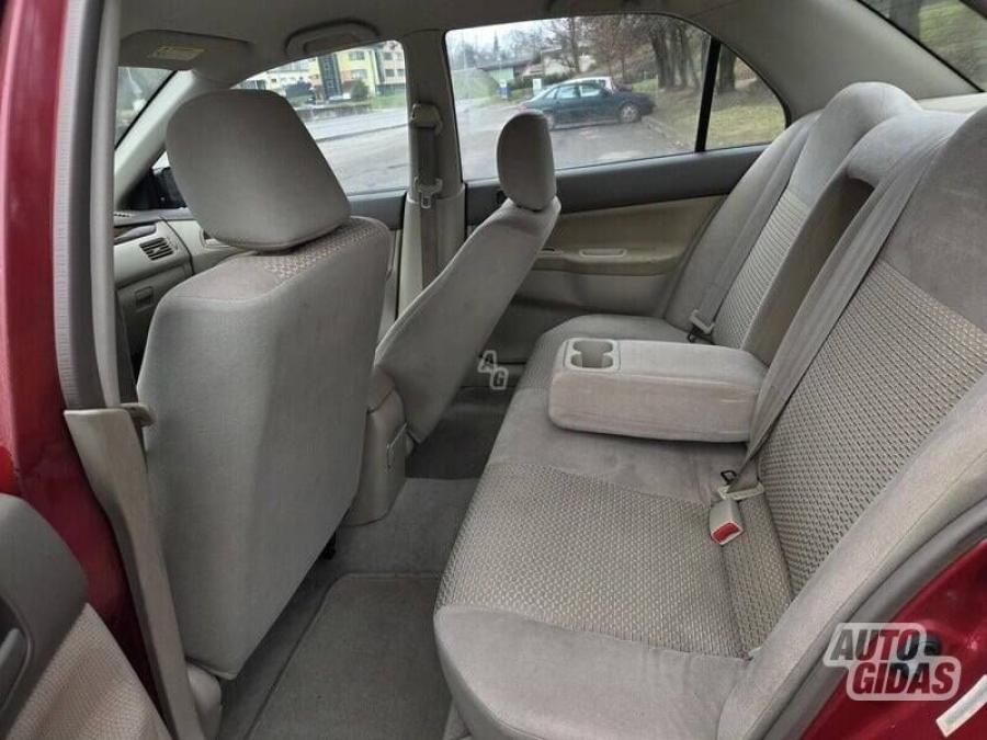 Red Mitsubishi Lancer 2002 in Marijampole, with an engine capacity of 2.00 L and mileage of 194 thousand km for 1800 €, photo 10 on AUTOMOTO.COM.LV