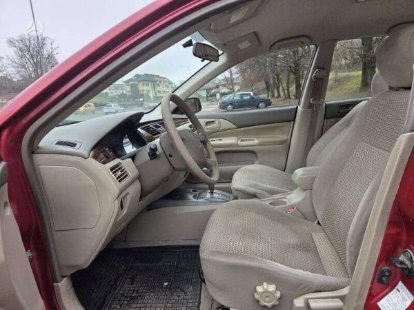 Sarkans Mitsubishi Lancer 2002 Marijampole, ar dzinēja tilpumu 2.00 L un nobraukumu 194 tūkst. km par 1800 €, foto 8 vietnē AUTOMOTO.COM.LV