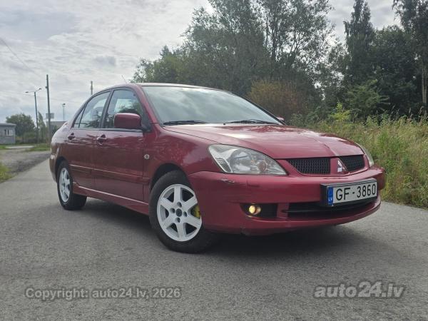 Mitsubishi Lancer 2006 in Tallinn on AUTOMOTO.COM.LV Red Mitsubishi Lancer 2006 in Tallinn, with an engine capacity of 1.60 L and mileage of 108 thousand km for 880 €, photo 4 on AUTOMOTO.COM.LV