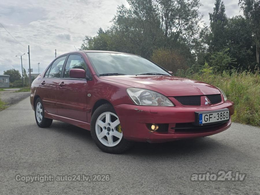 Red Mitsubishi Lancer 2006 in Tallinn, with an engine capacity of 1.60 L and mileage of 108 thousand km for 880 €, photo 4 on AUTOMOTO.COM.LV