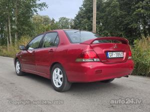 Red Mitsubishi Lancer 2006 in Tallinn, with an engine capacity of 1.60 L and mileage of 108 thousand km for 880 €, photo 5 on AUTOMOTO.COM.LV