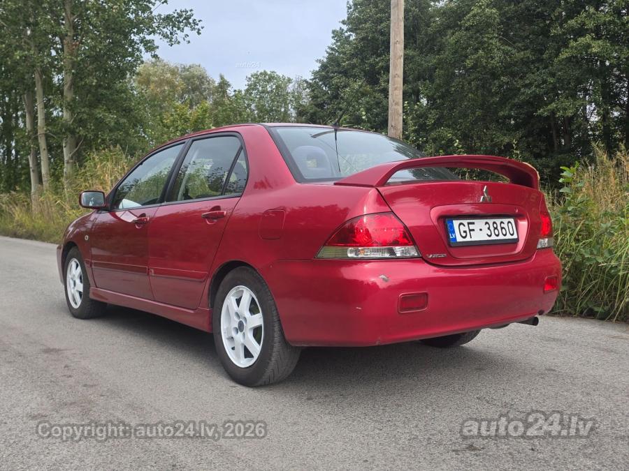 Red Mitsubishi Lancer 2006 in Tallinn, with an engine capacity of 1.60 L and mileage of 108 thousand km for 880 €, photo 5 on AUTOMOTO.COM.LV