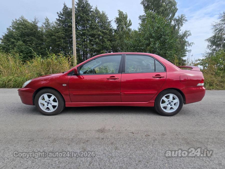 Red Mitsubishi Lancer 2006 in Tallinn, with an engine capacity of 1.60 L and mileage of 108 thousand km for 880 €, photo 6 on AUTOMOTO.COM.LV