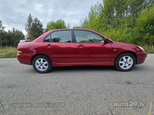 Red Mitsubishi Lancer 2006 in Tallinn, with an engine capacity of 1.60 L and mileage of 108 thousand km for 880 €, photo 7 on AUTOMOTO.COM.LV