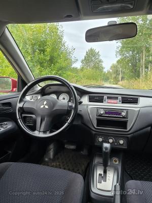 Red Mitsubishi Lancer 2006 in Tallinn, with an engine capacity of 1.60 L and mileage of 108 thousand km for 880 €, photo 15 on AUTOMOTO.COM.LV