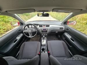 Red Mitsubishi Lancer 2006 in Tallinn, with an engine capacity of 1.60 L and mileage of 108 thousand km for 880 €, photo 16 on AUTOMOTO.COM.LV