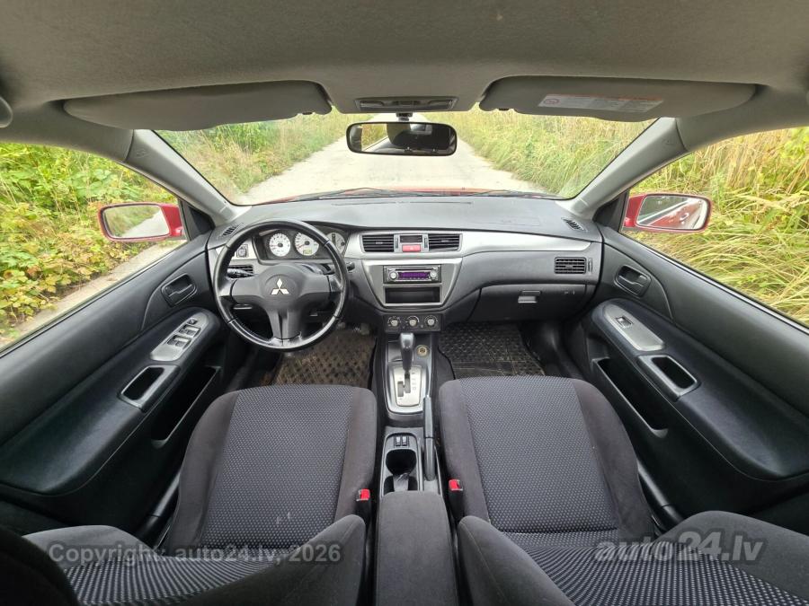 Red Mitsubishi Lancer 2006 in Tallinn, with an engine capacity of 1.60 L and mileage of 108 thousand km for 880 €, photo 16 on AUTOMOTO.COM.LV