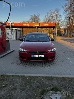 Sarkans Mitsubishi Lancer 2007 Jelgava, ar dzinēja tilpumu 1.50 L un nobraukumu 330 tūkst. km par 2490 €, foto 2 vietnē AUTOMOTO.COM.LV