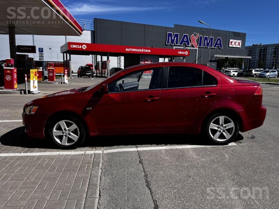 Red Mitsubishi Lancer 2007 in Riga, with an engine capacity of 1.50 L and mileage of 301 thousand km for 2200 €, photo 1 on AUTOMOTO.COM.LV