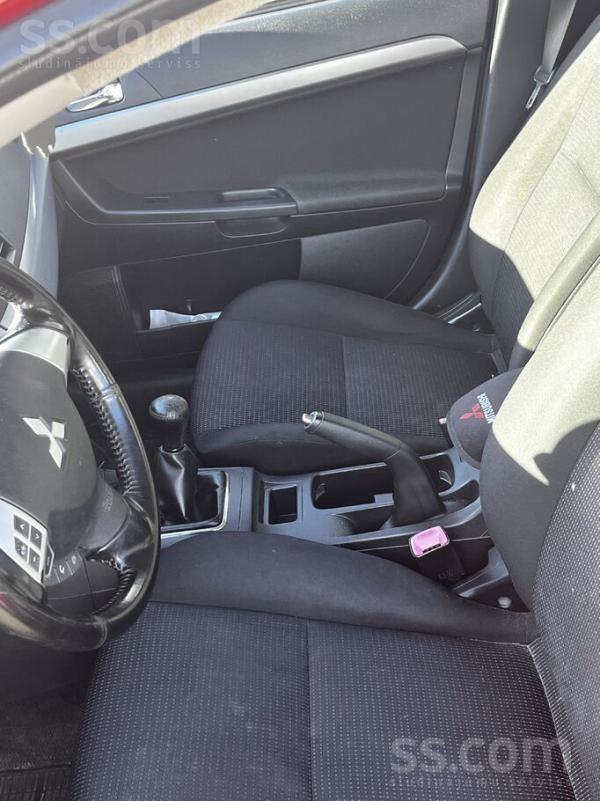 Sarkans Mitsubishi Lancer 2007 Rīga, ar dzinēja tilpumu 1.50 L un nobraukumu 301 tūkst. km par 2200 €, foto 5 vietnē AUTOMOTO.COM.LV