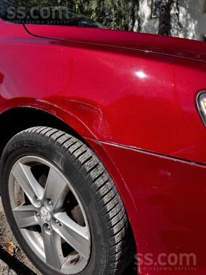 Red Mitsubishi Lancer 2007 in Riga, with an engine capacity of 1.50 L and mileage of 301 thousand km for 2200 €, photo 10 on AUTOMOTO.COM.LV