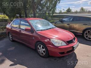 Sarkans Mitsubishi Lancer 2007 Rīga, ar dzinēja tilpumu 1.60 L un nobraukumu 247 tūkst. km par 800 €, foto  vietnē AUTOMOTO.COM.LV