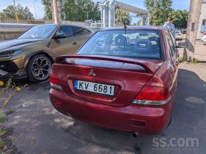 Red Mitsubishi Lancer 2007 in Riga, with an engine capacity of 1.60 L and mileage of 247 thousand km for 800 €, photo 3 on AUTOMOTO.COM.LV
